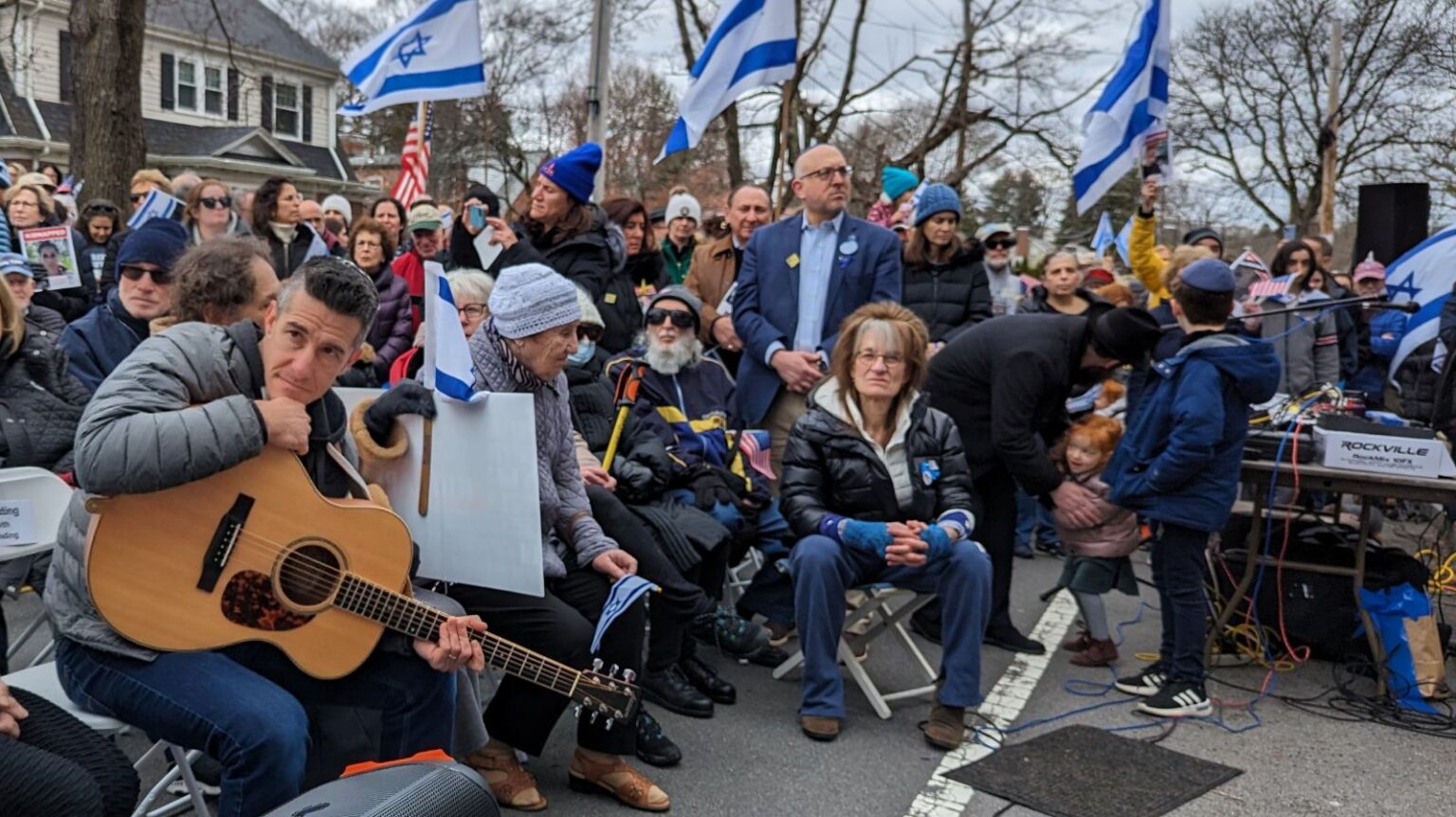 Community stands large against hate at wall display rededication ...